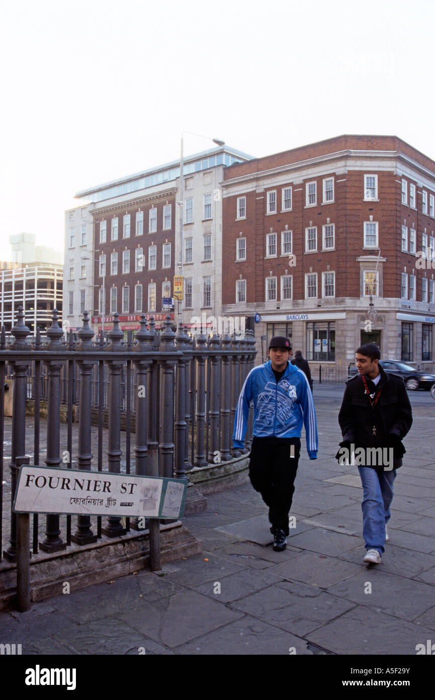 Mile End London walking past the Fournier Street sign in Mile End ...