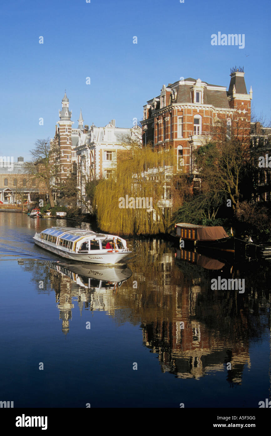 Netherlands Amsterdam canal scene sightseeing boat Stock Photo - Alamy