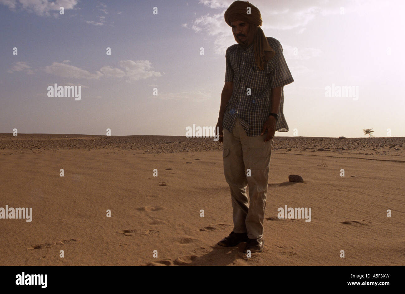Muslim man praying in desert hi-res stock photography and images - Alamy