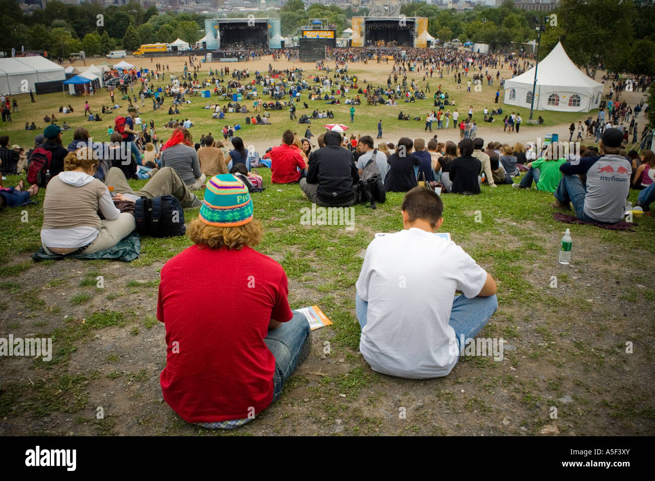 Crowds of fans at an outdoor Summer music festival in Parc Jean-Drapeau ...