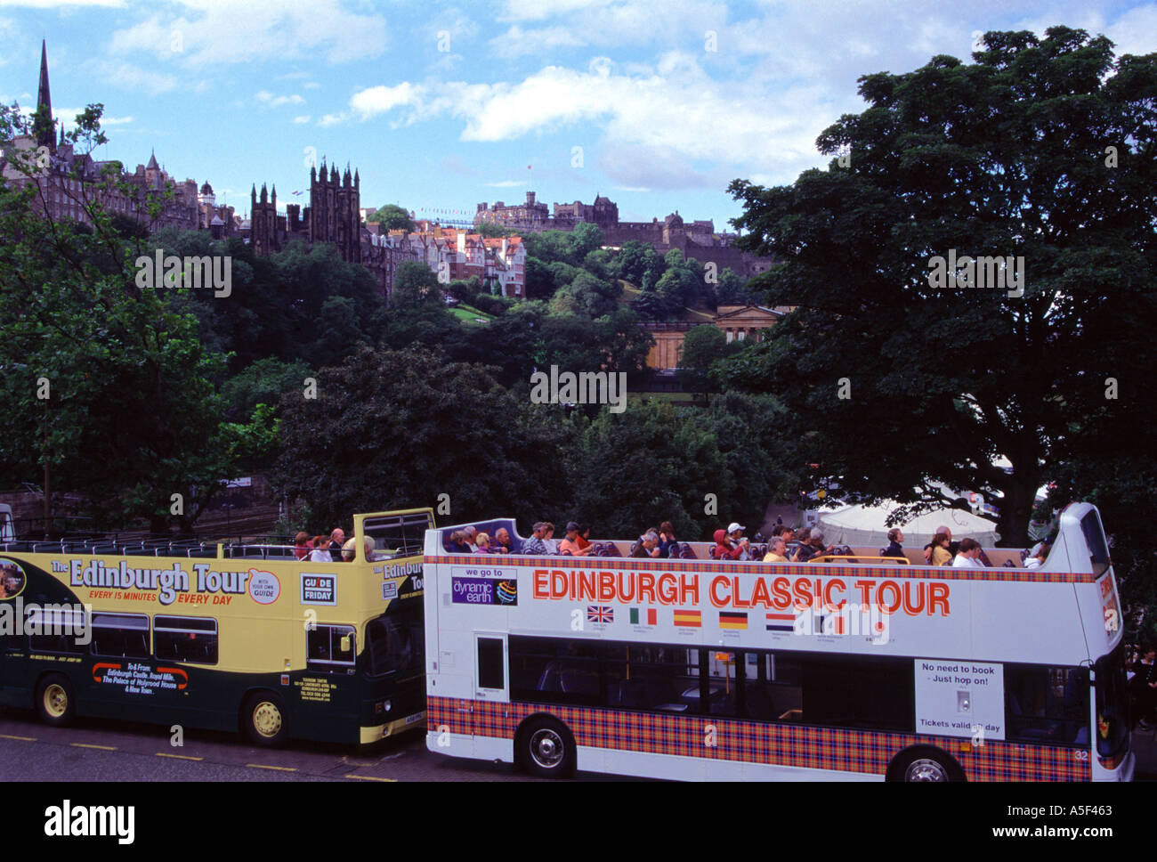 Edinburgh tour bus with Edinburgh Castle in background Stock Photo - Alamy