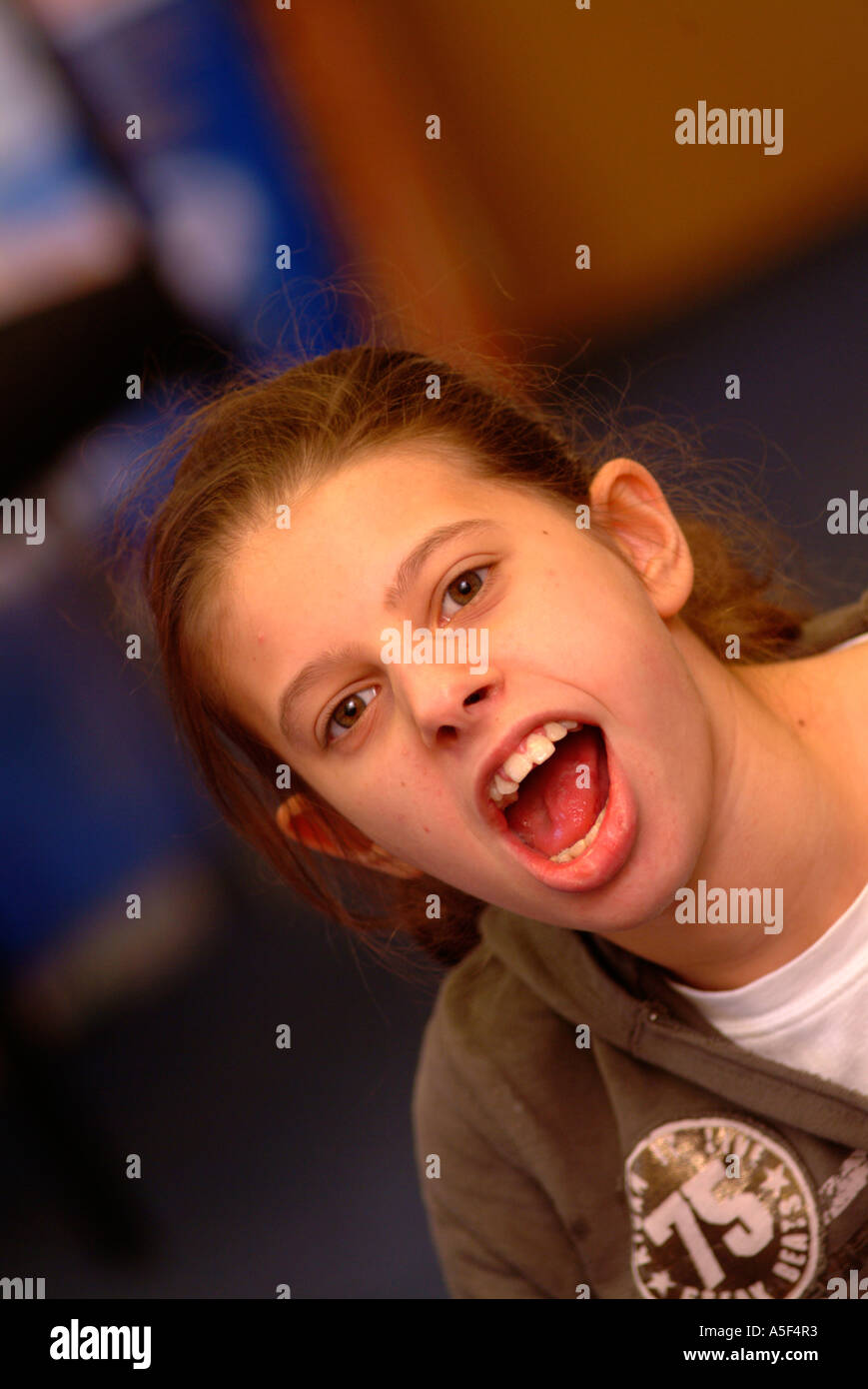 Young girl with learning difficulties in creche, London, UK Stock Photo ...