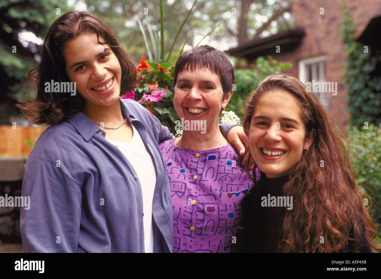 Tongan American daughters age 15 and 16 embracing mom age 48. St Paul ...