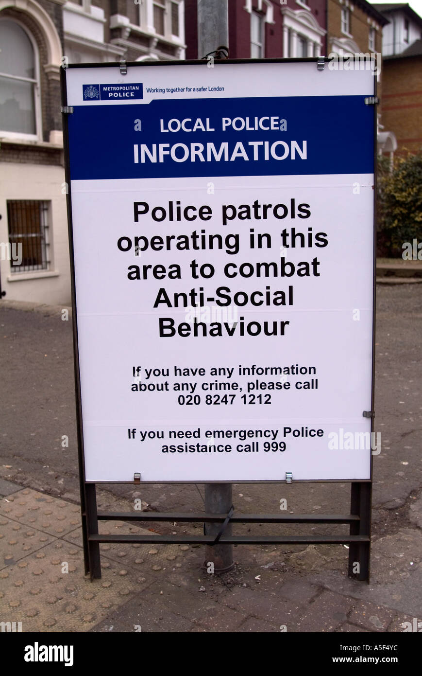 Metropolitan police sign warning of police presence in area to combat ...