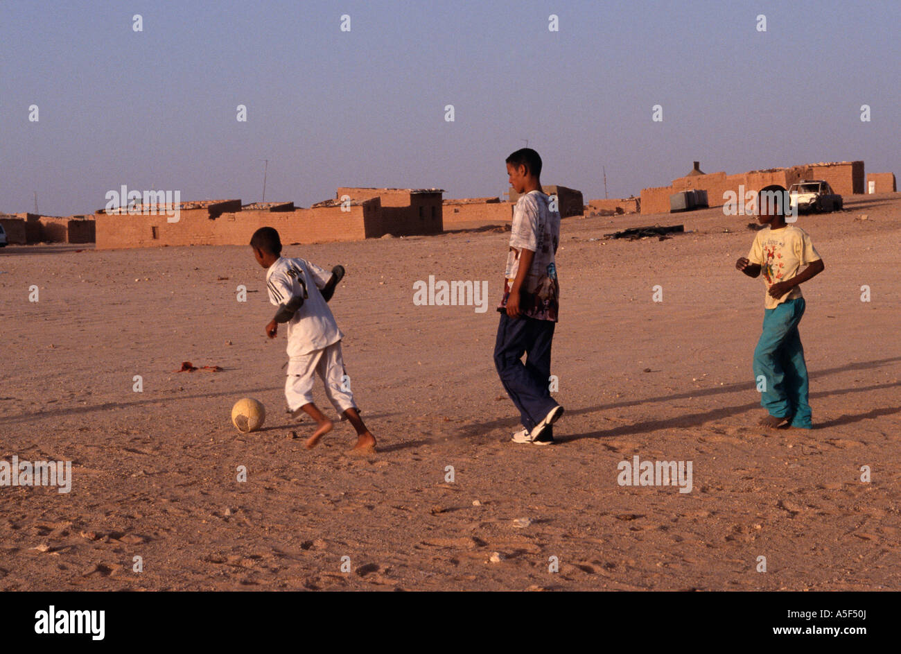 Children playing ball rural africa hi-res stock photography and images ...