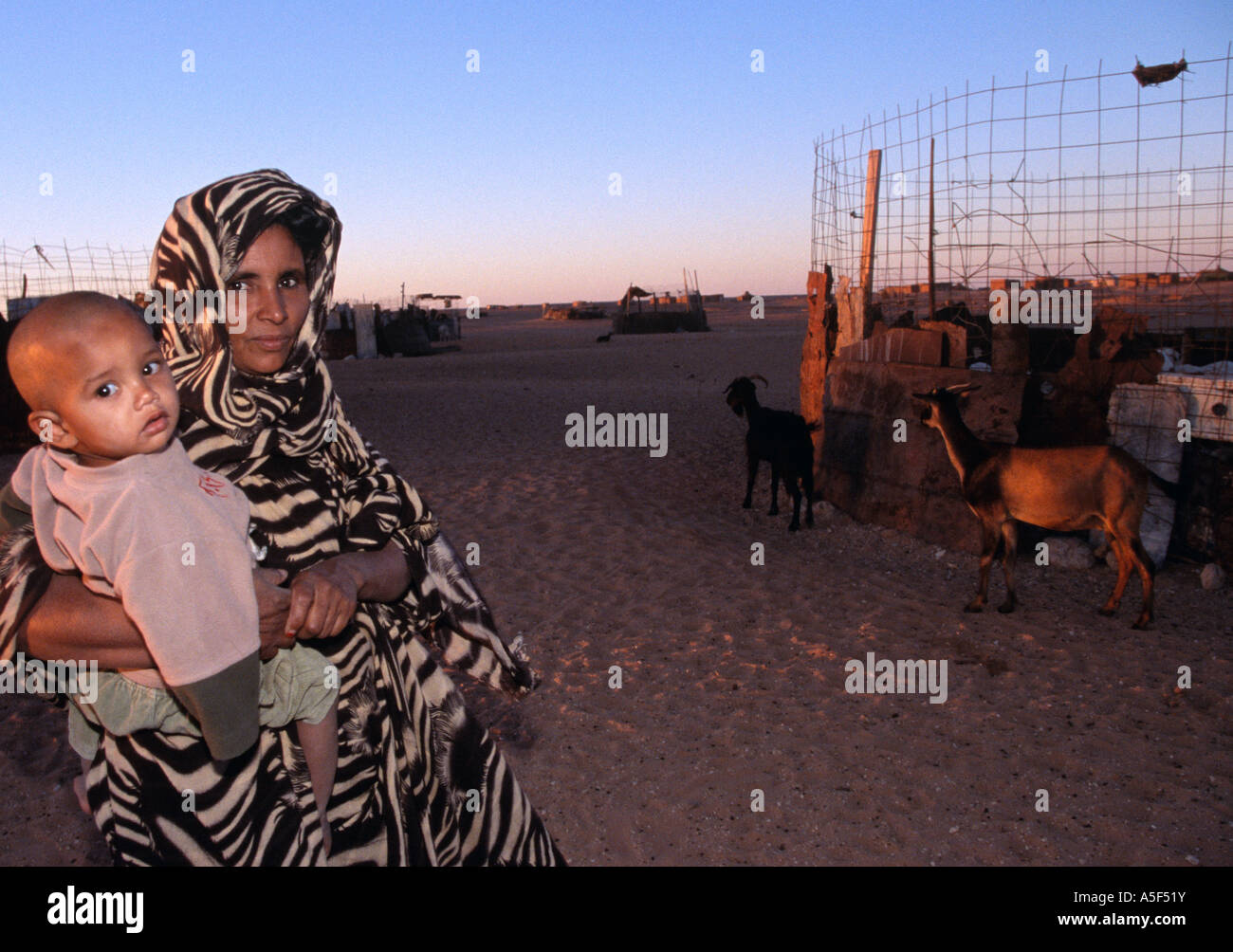 Woman baby in refugee hi-res stock photography and images - Alamy