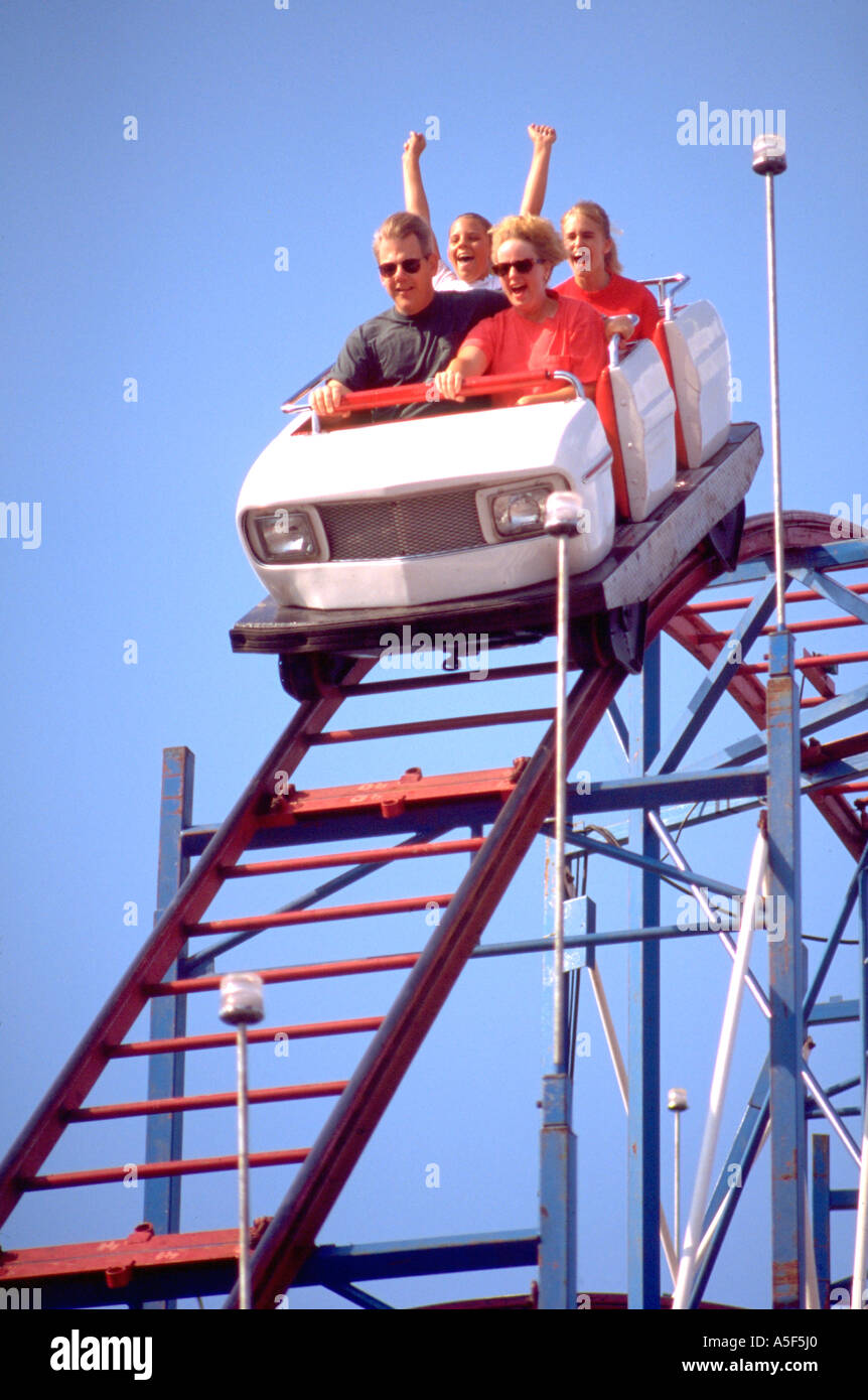 Family riding roller coaster at state fair age parents 35 children 13 ...