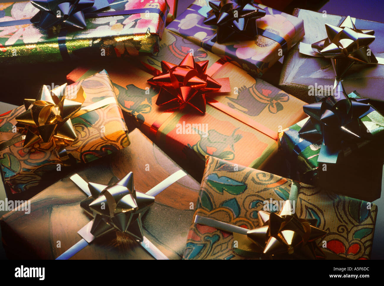 presents wrapped in colourful paper Stock Photo - Alamy