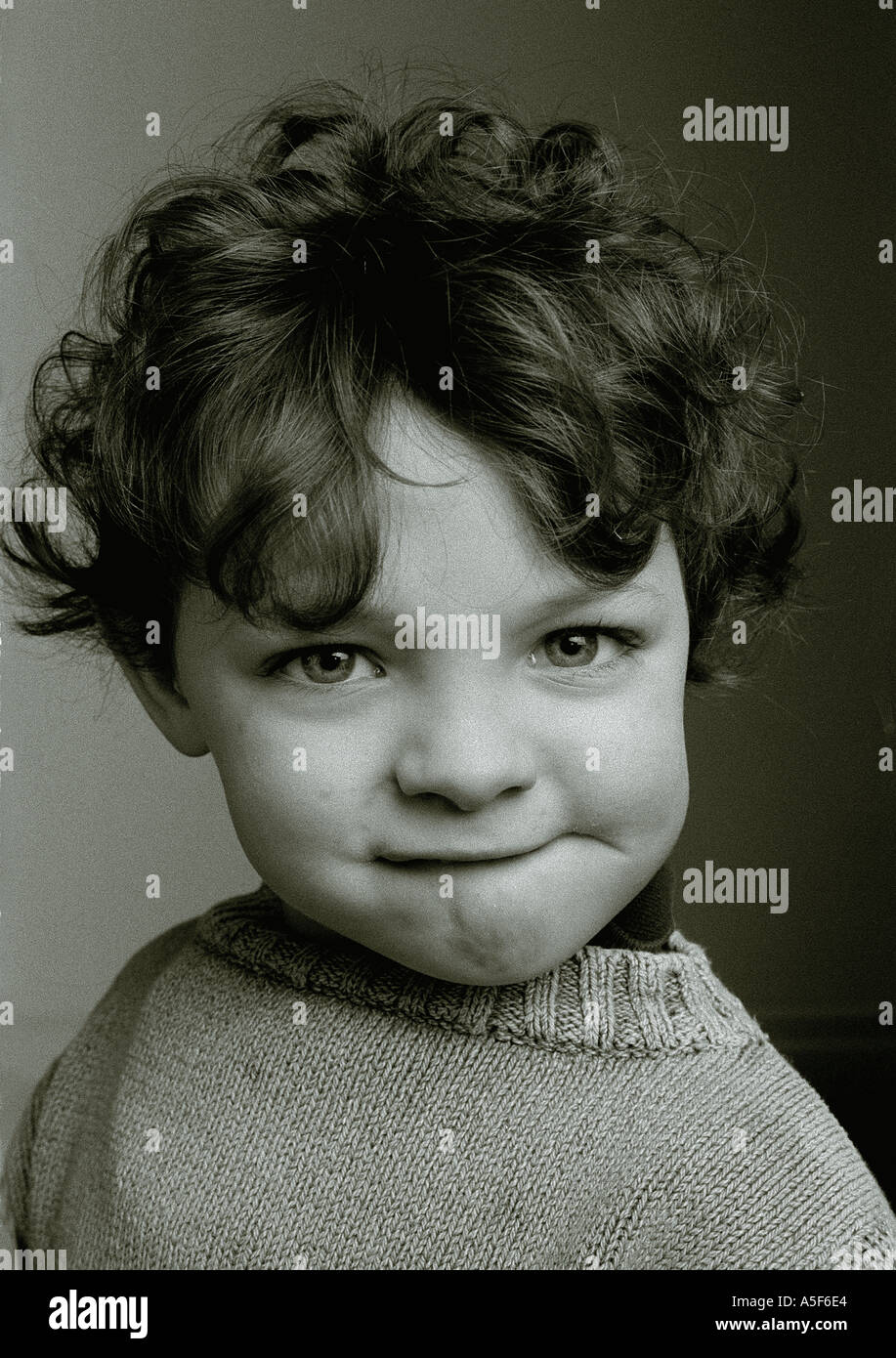 portrait of cheeky boy Stock Photo - Alamy