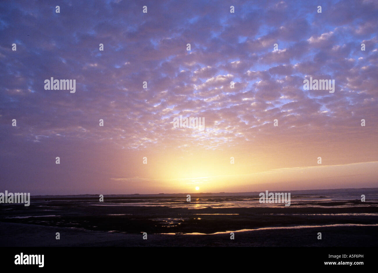 Beautiful sunset over ocean Stock Photo - Alamy