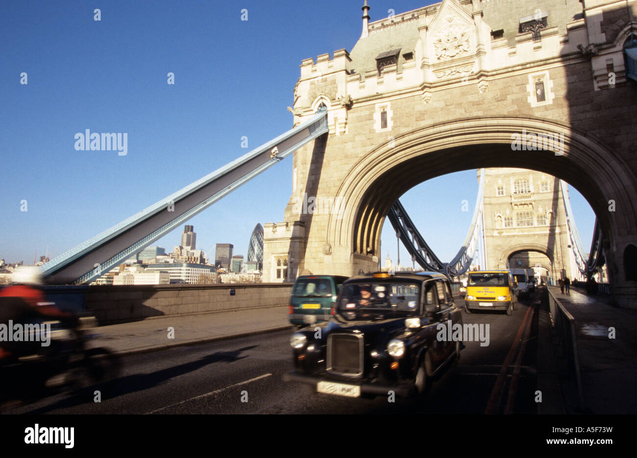 Cars driving past on the Tower Bridge in London Stock Photo - Alamy