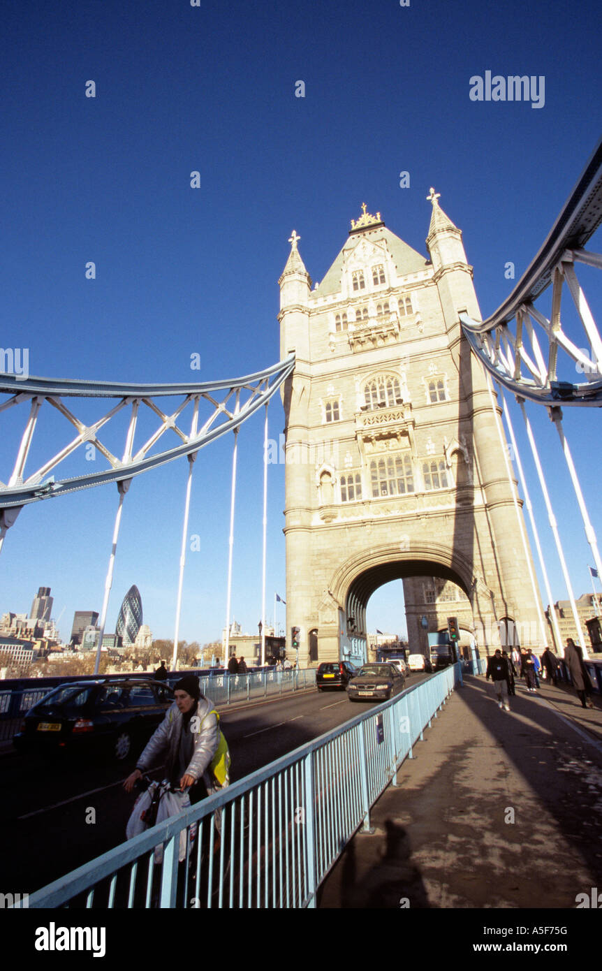 People commuting through the Tower Bridge in London Stock Photo - Alamy