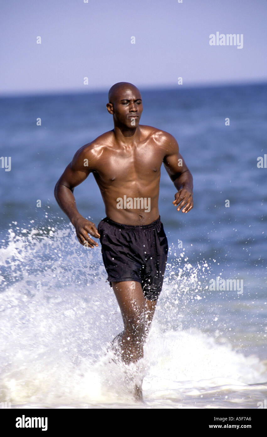 African American Man on a Beach Stock Photo - Alamy