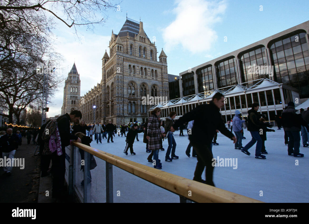 People skating on an ice skating rink outside the Victoria and Albert ...
