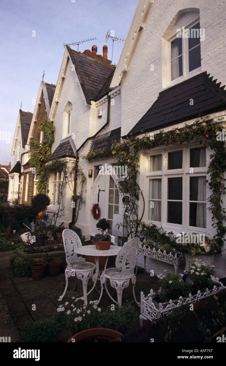 Row of traditional whitewash houses with quaint garden, Wimbledon ...