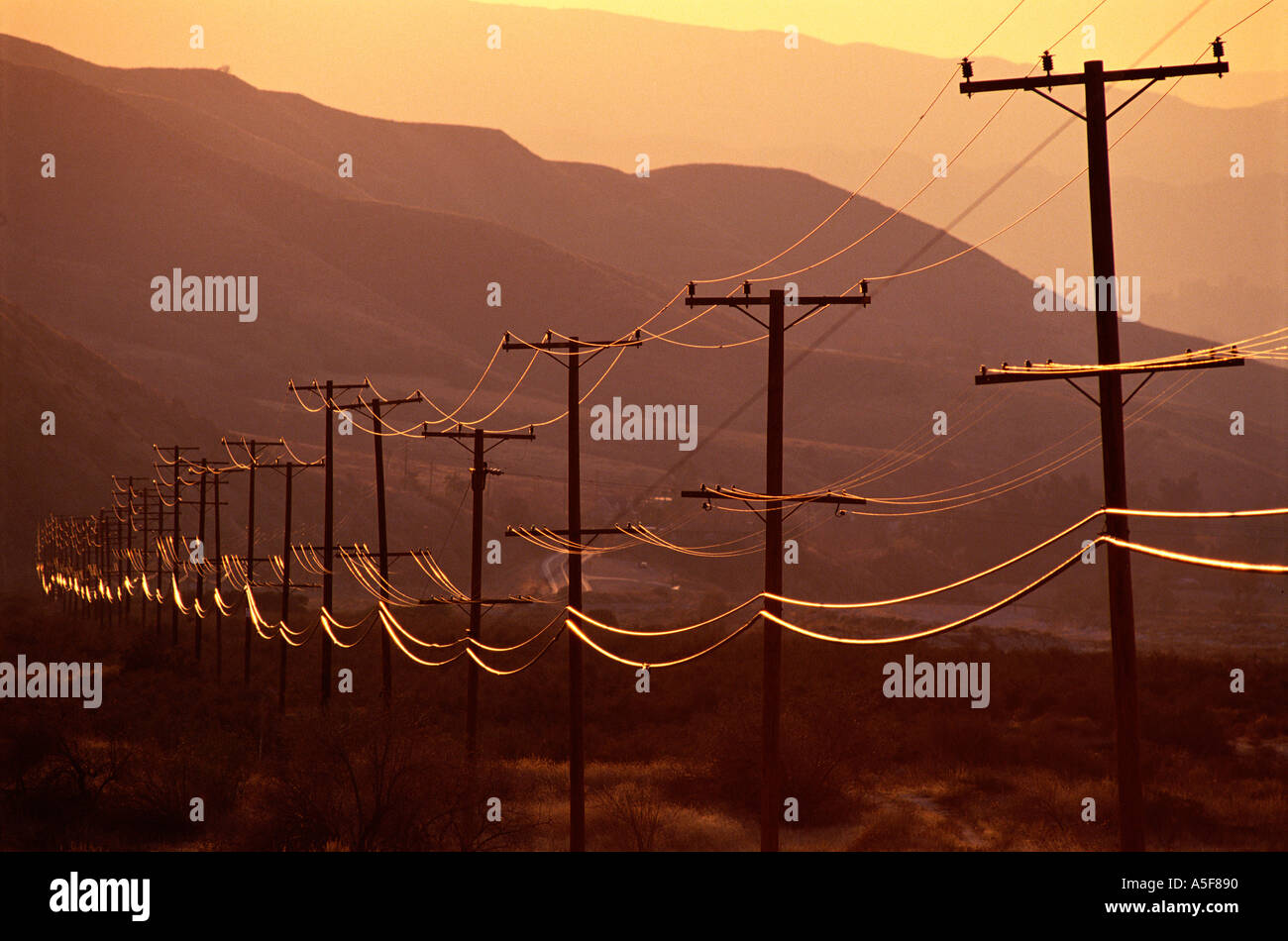Power lines stretching into distance hi-res stock photography and ...