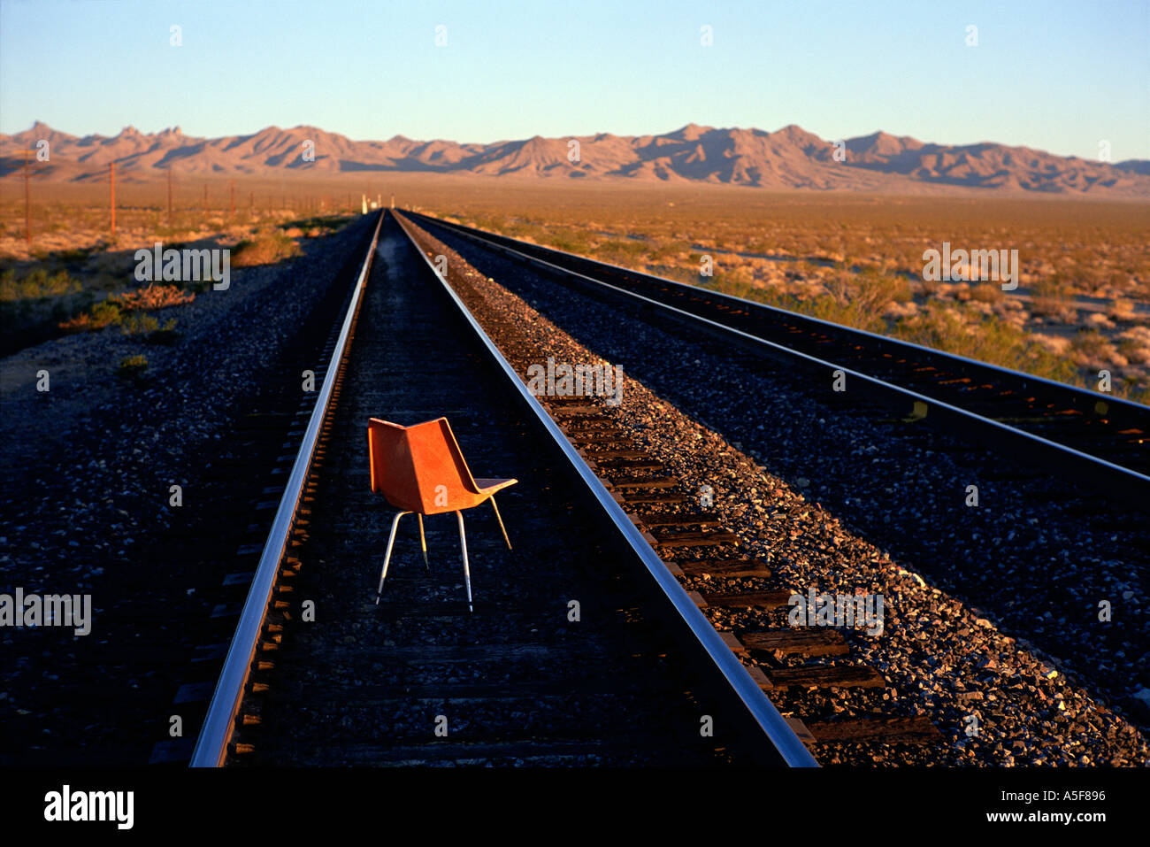 Chair sitting on railroad tracks in Death Valley California USA Stock ...