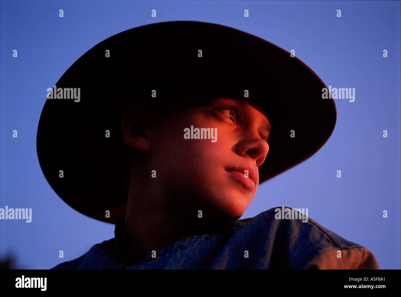 Low angle view of boy wearing cowboy hat Stock Photo - Alamy