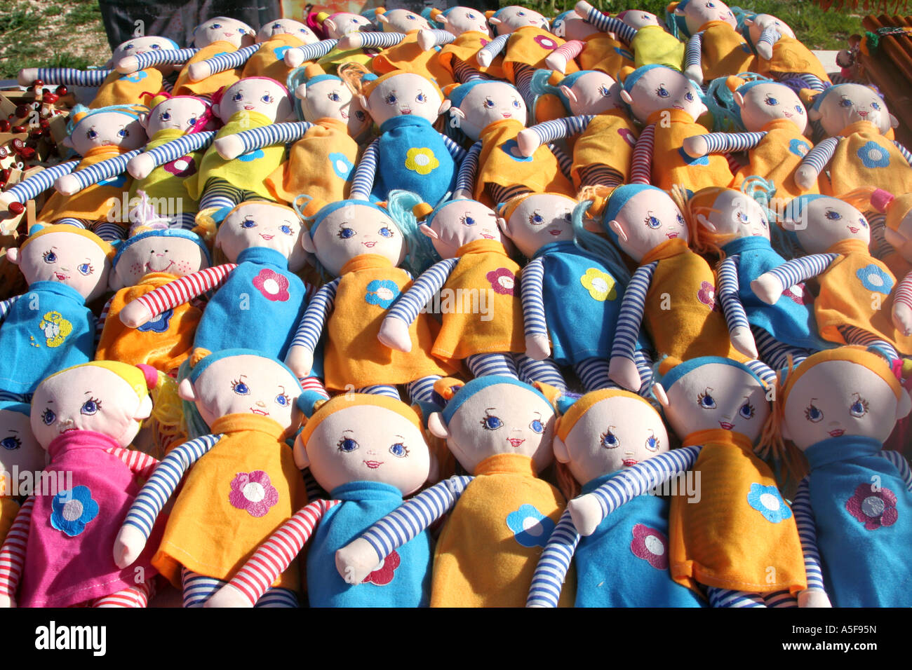 many rag dolls on display at a market Stock Photo - Alamy
