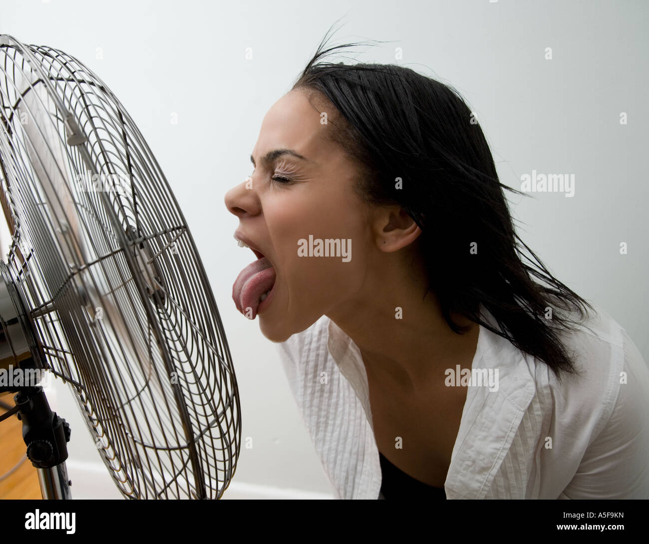 woman with fan Stock Photo - Alamy