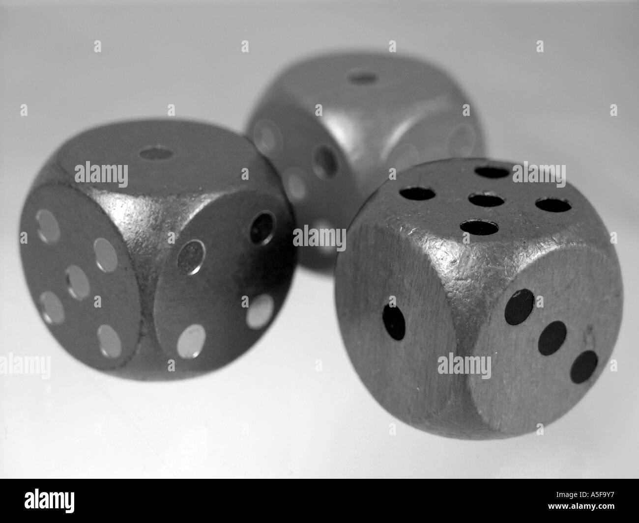 Wooden coloured dice in stack hi-res stock photography and images - Alamy