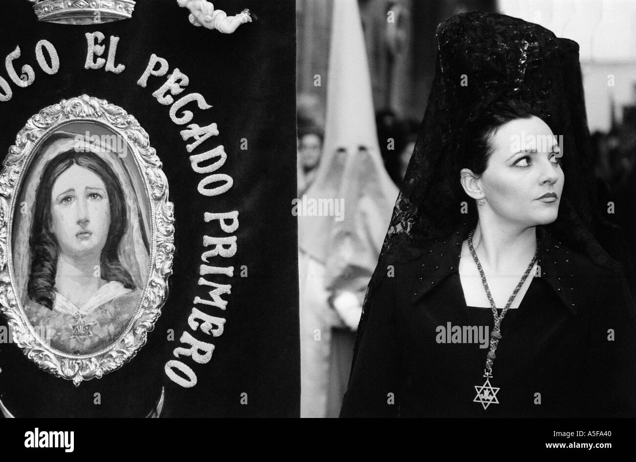 Spanish Woman in Traditional Dress and Easter Banner Stock Photo - Alamy