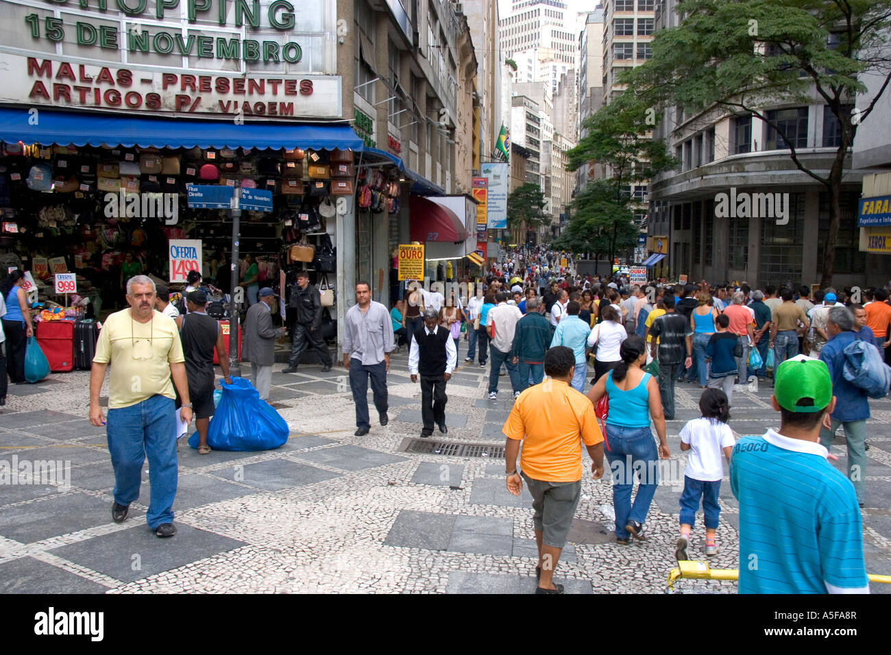 People and store fronts on a walking street in Sao Paulo Brazil Stock ...