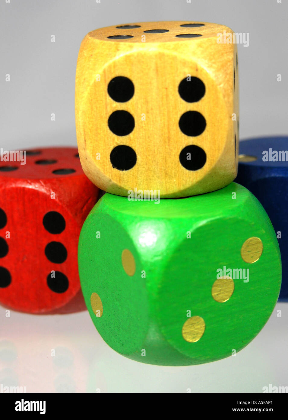 wooden coloured dice Stock Photo - Alamy
