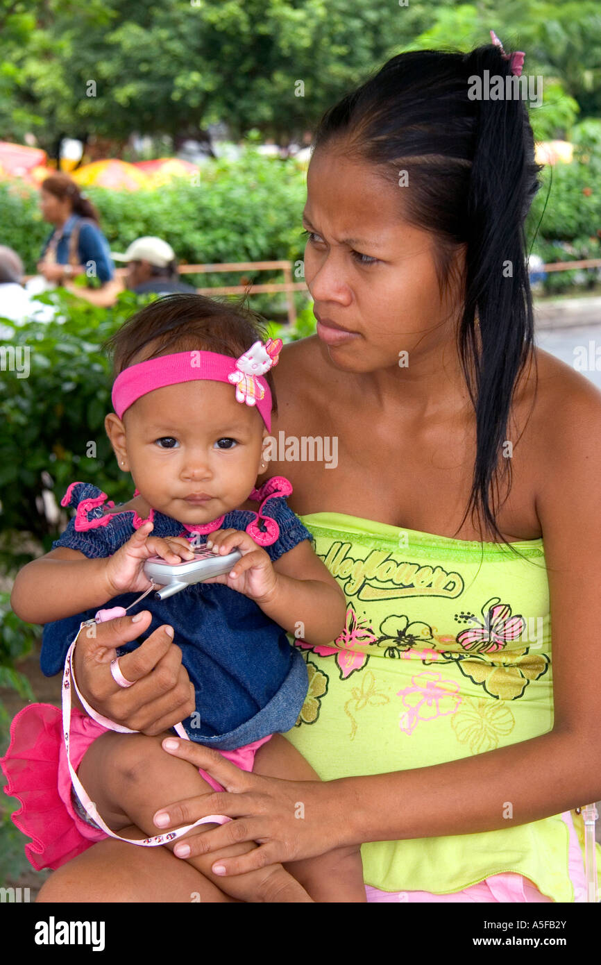 Brazilian woman holding her baby in Manaus Brazil Stock Photo - Alamy