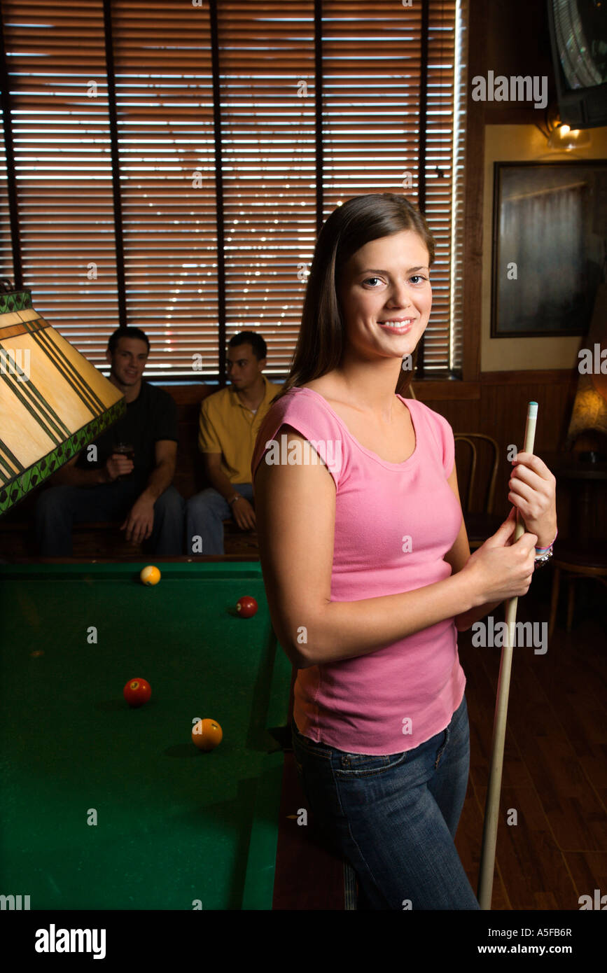 Portrait woman standing table hi-res stock photography and images - Alamy