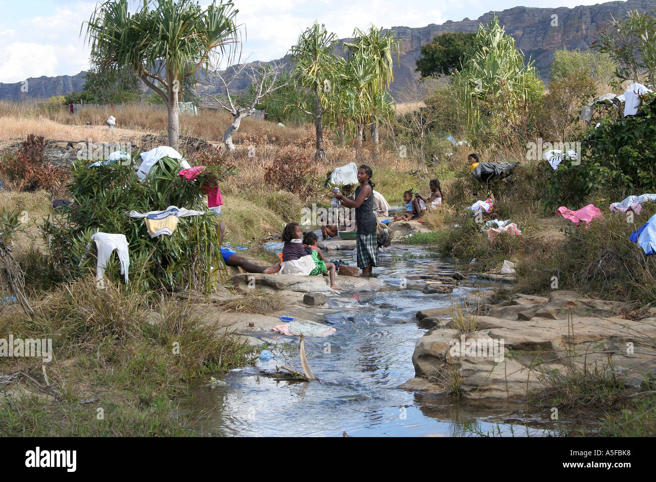 African women wash in river hi-res stock photography and images - Alamy