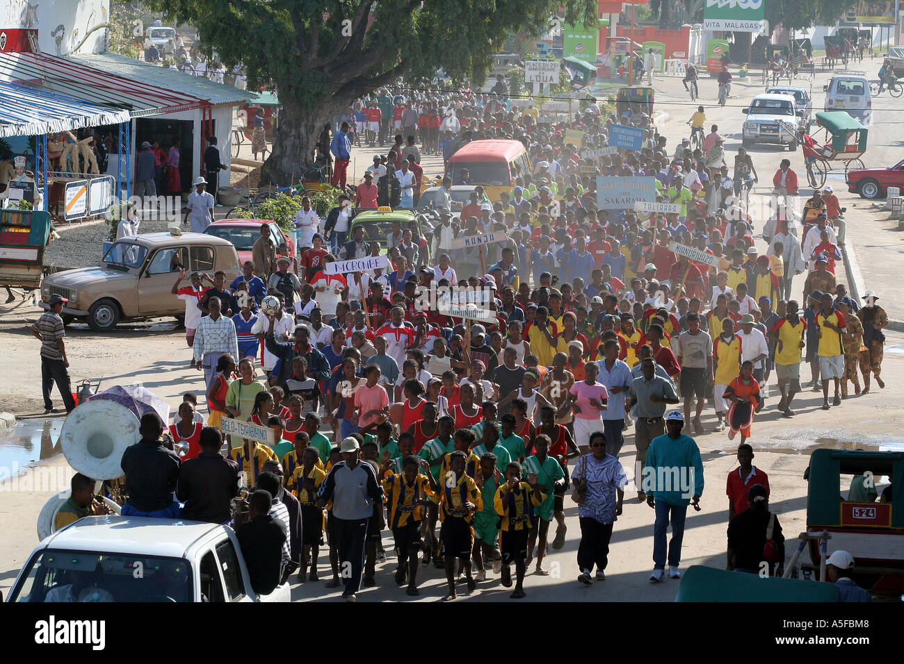 Madagascar, crowd of football players parade before a tournament ...