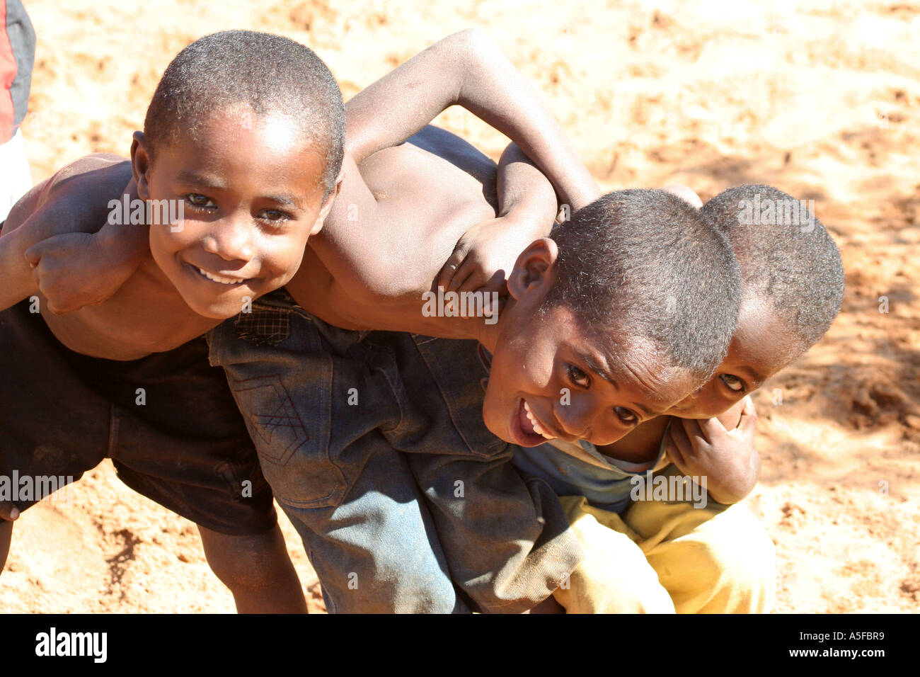 Madagascar, Children being playful Stock Photo - Alamy