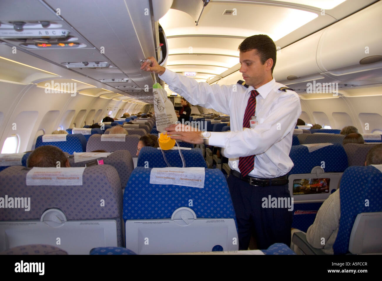 Airplane oxygen mask hi-res stock photography and images - Alamy