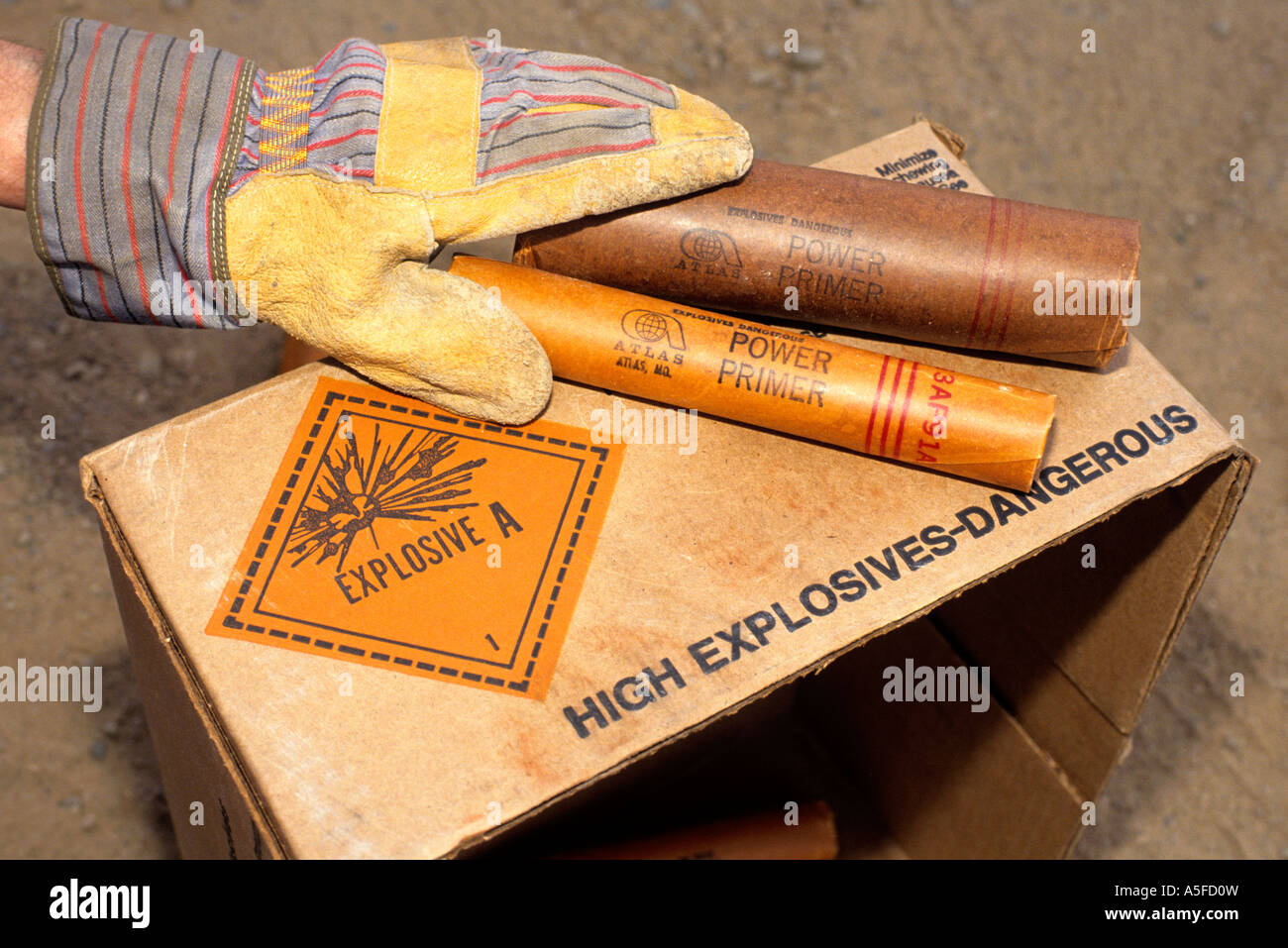 A person holding sticks of dynamite Stock Photo - Alamy