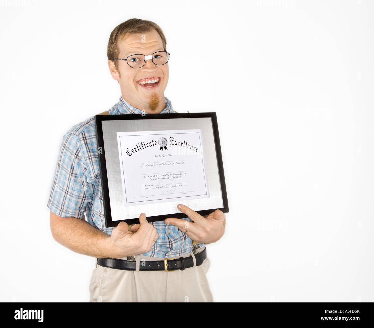 Caucasian young man dressed like nerd holding certificate and smiling ...