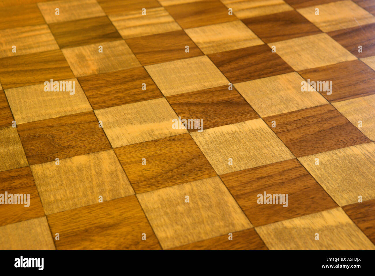 Brown and tan checkered wooden floor Stock Photo - Alamy