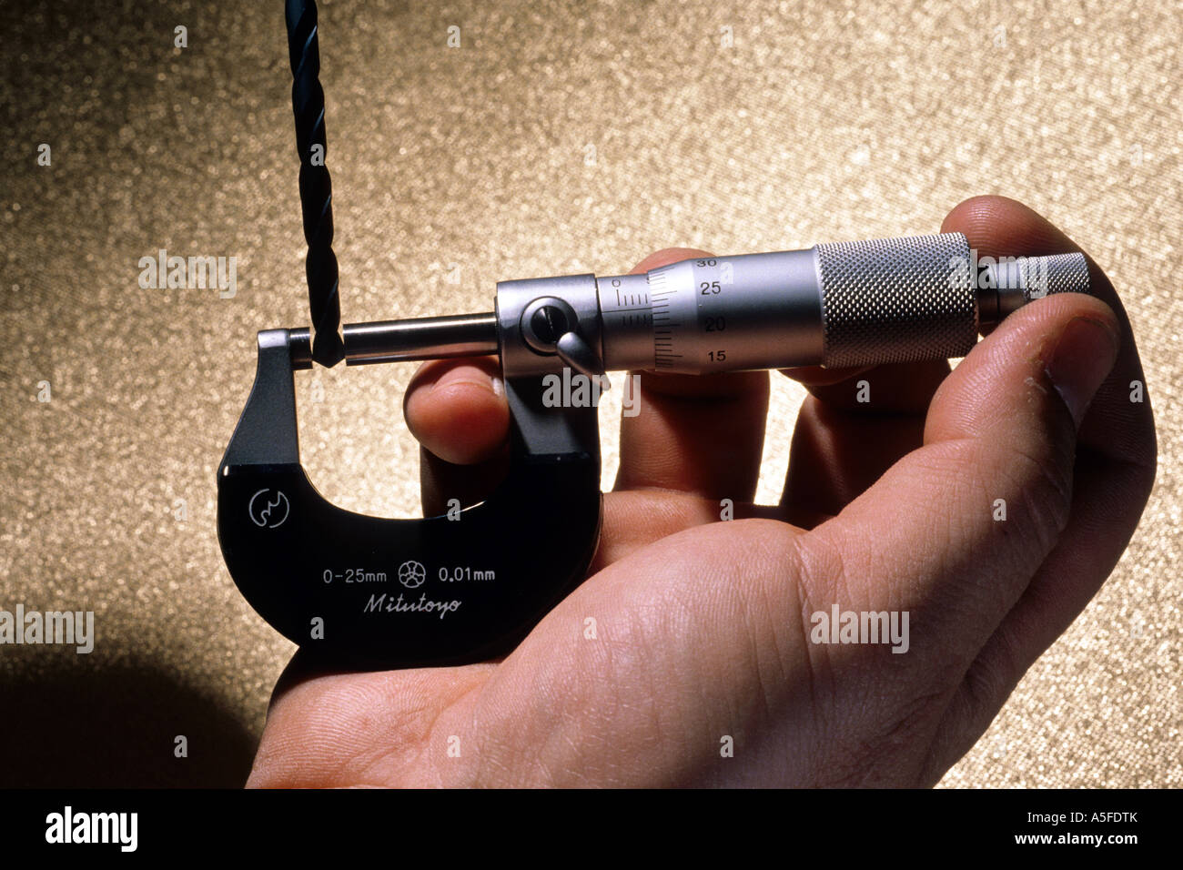 Micrometer measuring a drill bit Stock Photo - Alamy