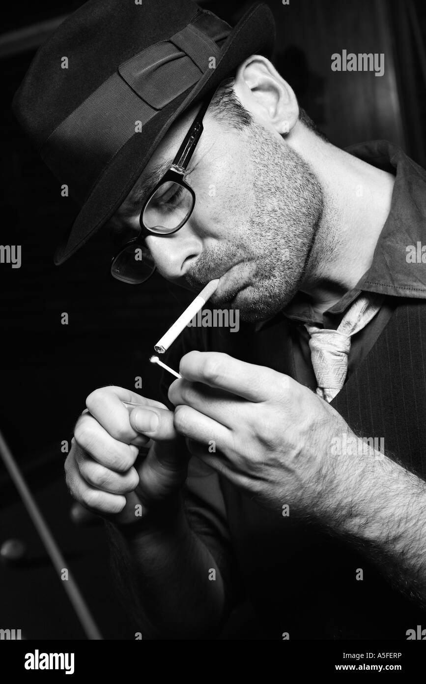 Lighting cigarette match hi-res stock photography and images - Alamy