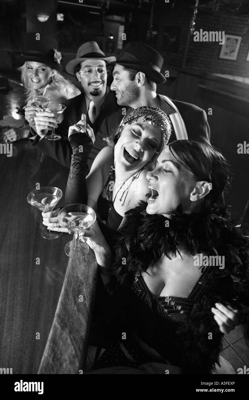 Caucasian prime adult retro females and males sitting at bar Stock ...