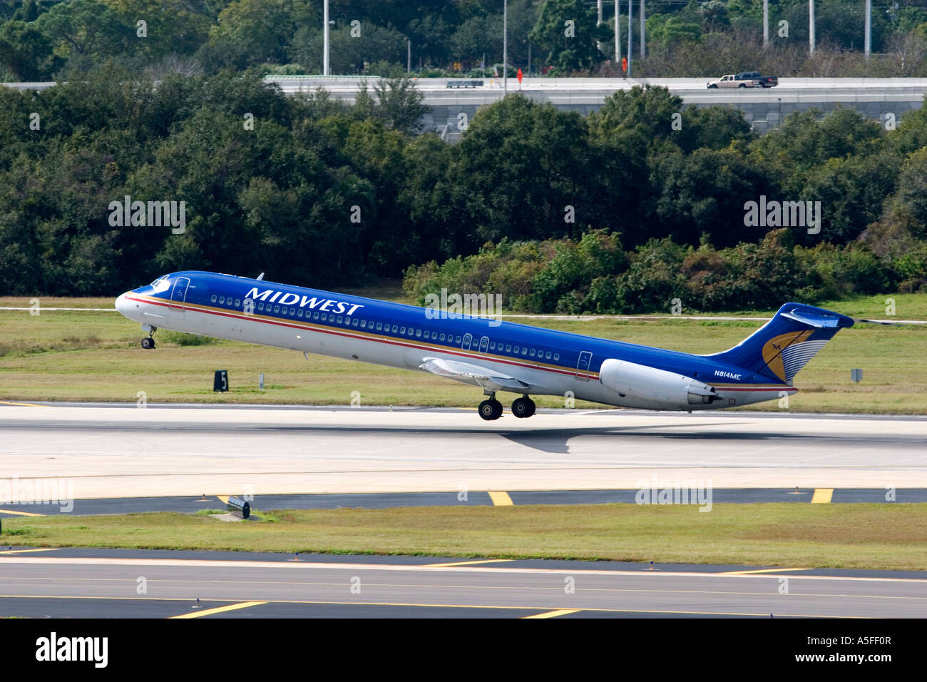 Midwest MD 80 airliner taking off from the Tampa International Airport ...