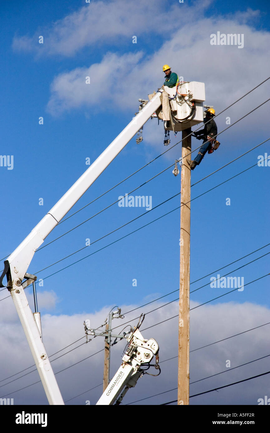 Electric power lineman installing new lines in Boise Idaho Stock Photo ...