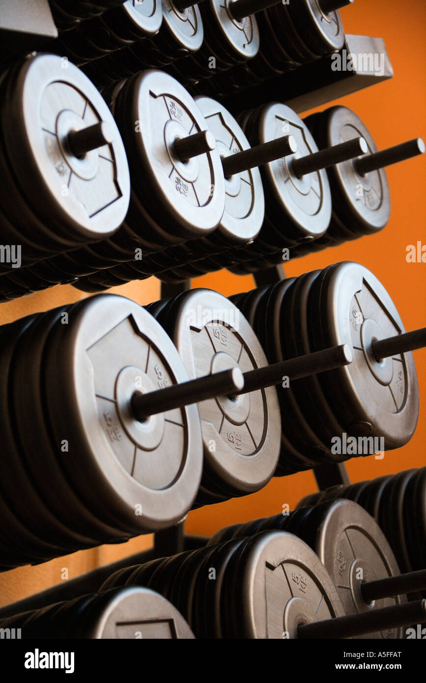 Stacked barbells with weights Stock Photo - Alamy