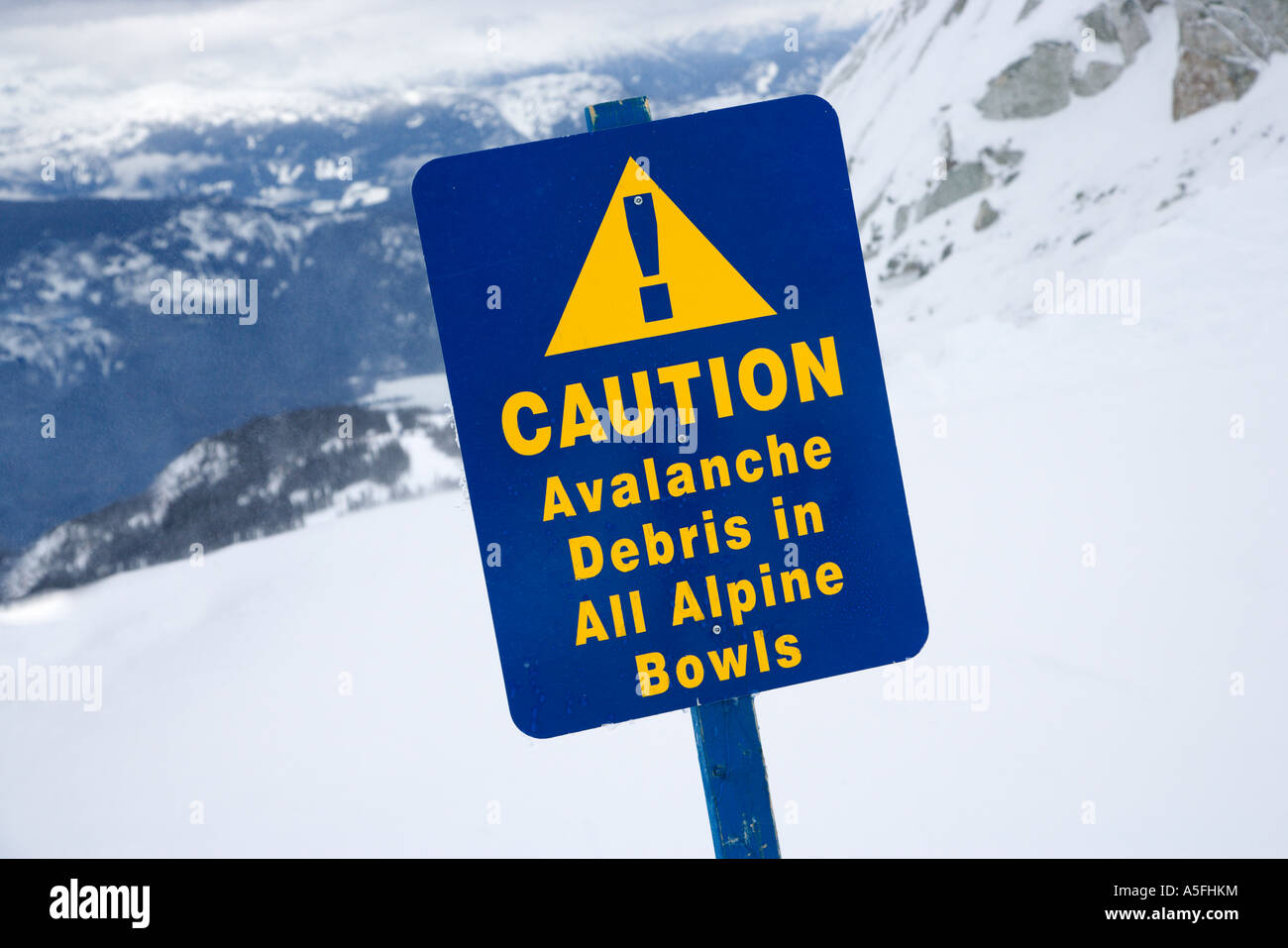 Snow ski resort caution sign on mountain side Stock Photo - Alamy
