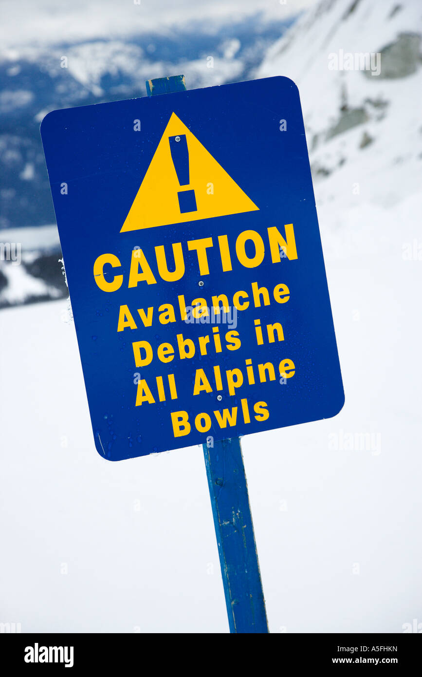 Snow ski resort caution sign on mountain side Stock Photo - Alamy