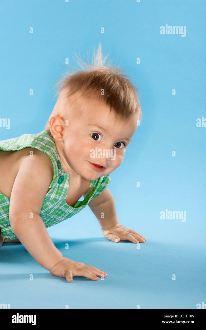 Portrait of Caucasian male child crawling Stock Photo - Alamy