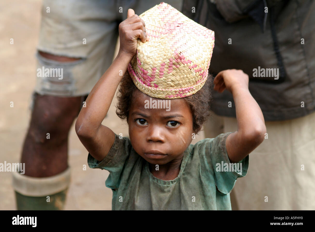Local people line the rail when the famous FCE railroad train passes ...