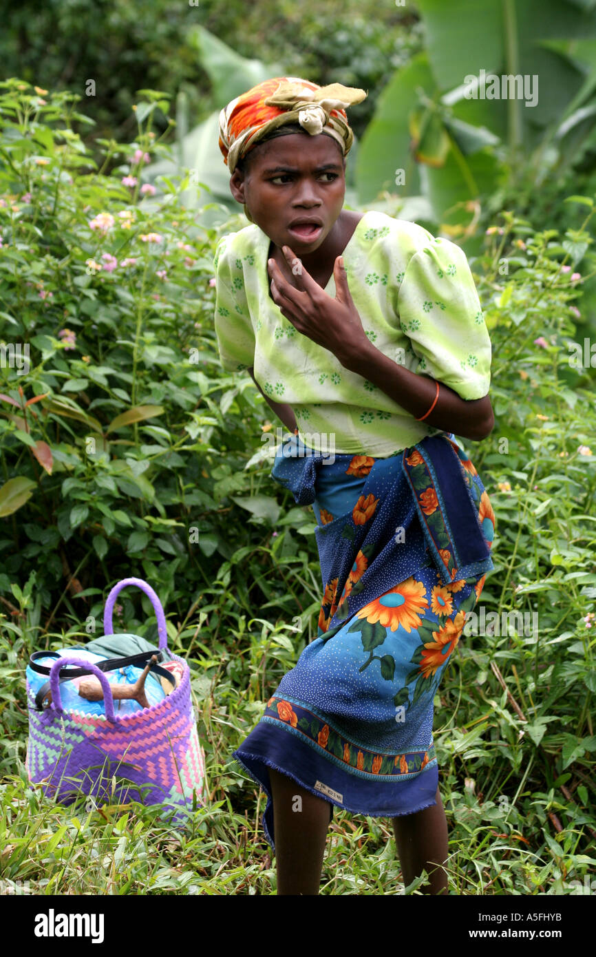 Local people line the rail when the famous FCE railroad train passes ...