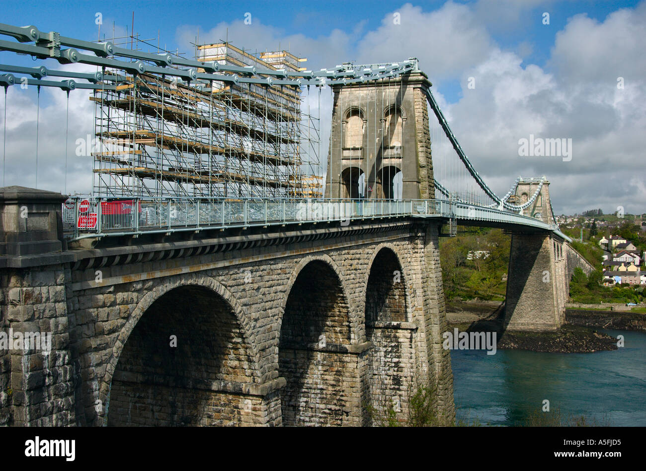 The Menai Bridge spanning the Menai Strait between Anglesey and the ...