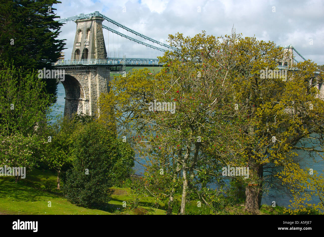 The Menai Bridge spanning the Menai Strait between Anglesey and the ...